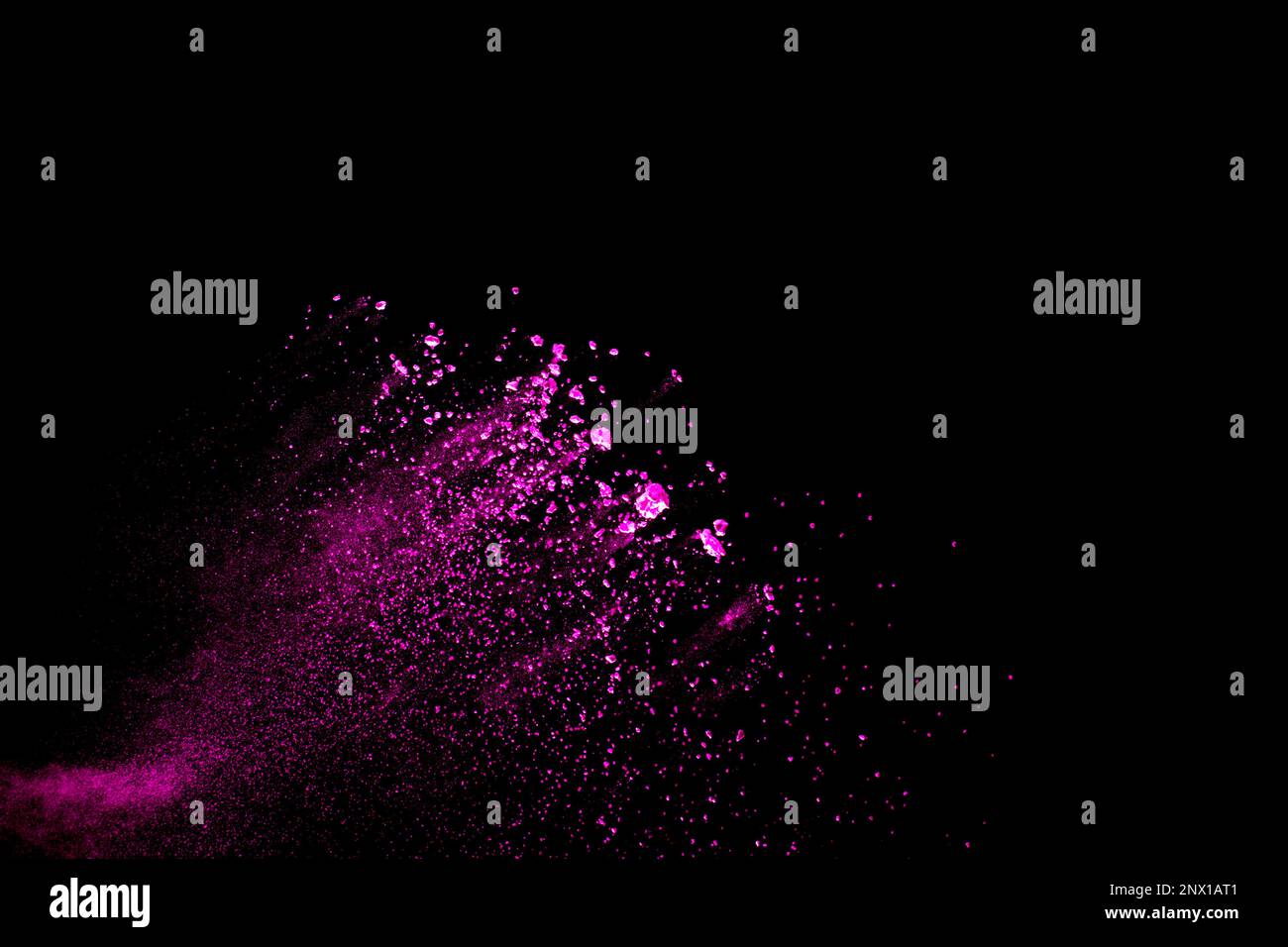 Purple color powder explosion cloud on black background.Purple dust ...