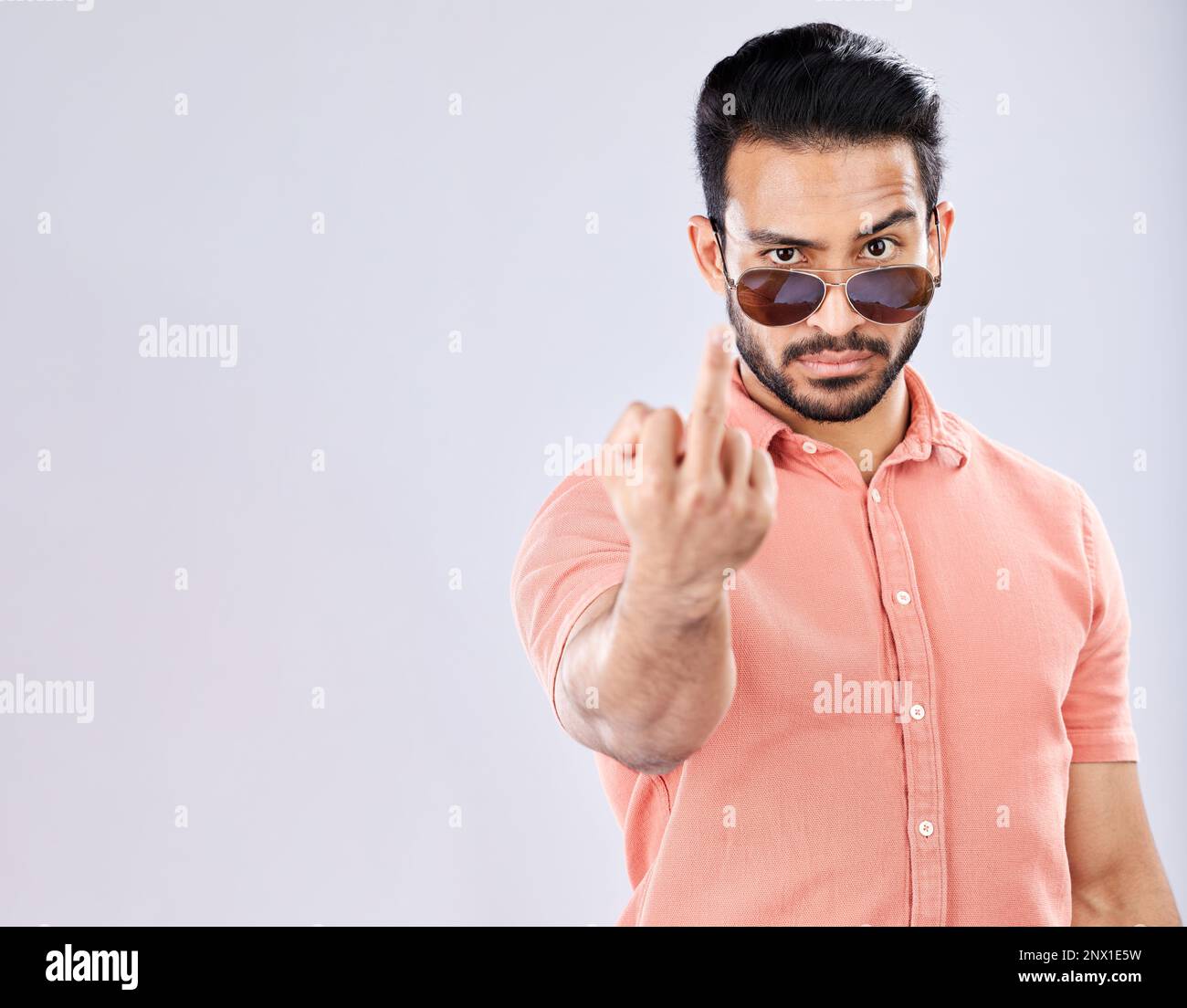 Cool Rude And Portrait Of An Asian Man With A Middle Finger Isolated
