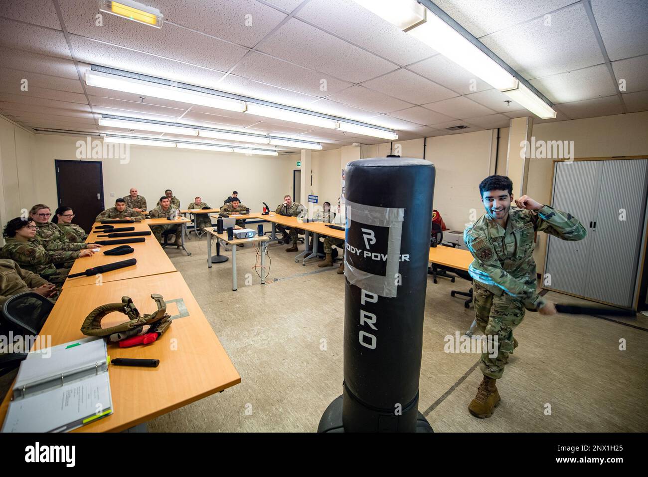 An Airman from the 423d Security Forces Squadron demonstrates how to ...