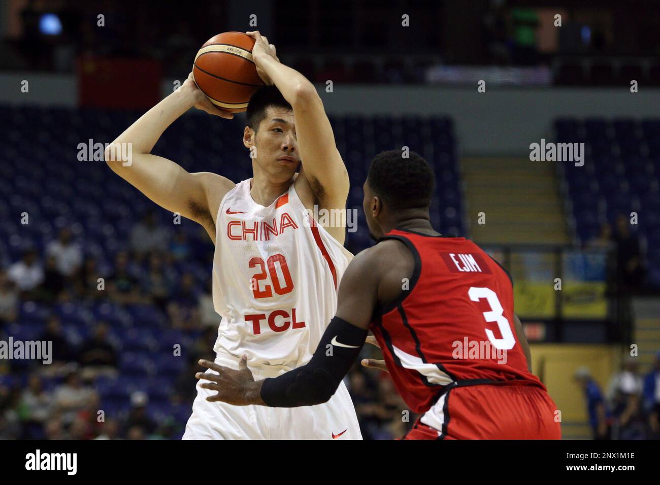 Canada's Melvin Ejim guards China's Jun-Fei Ren during first half of ...
