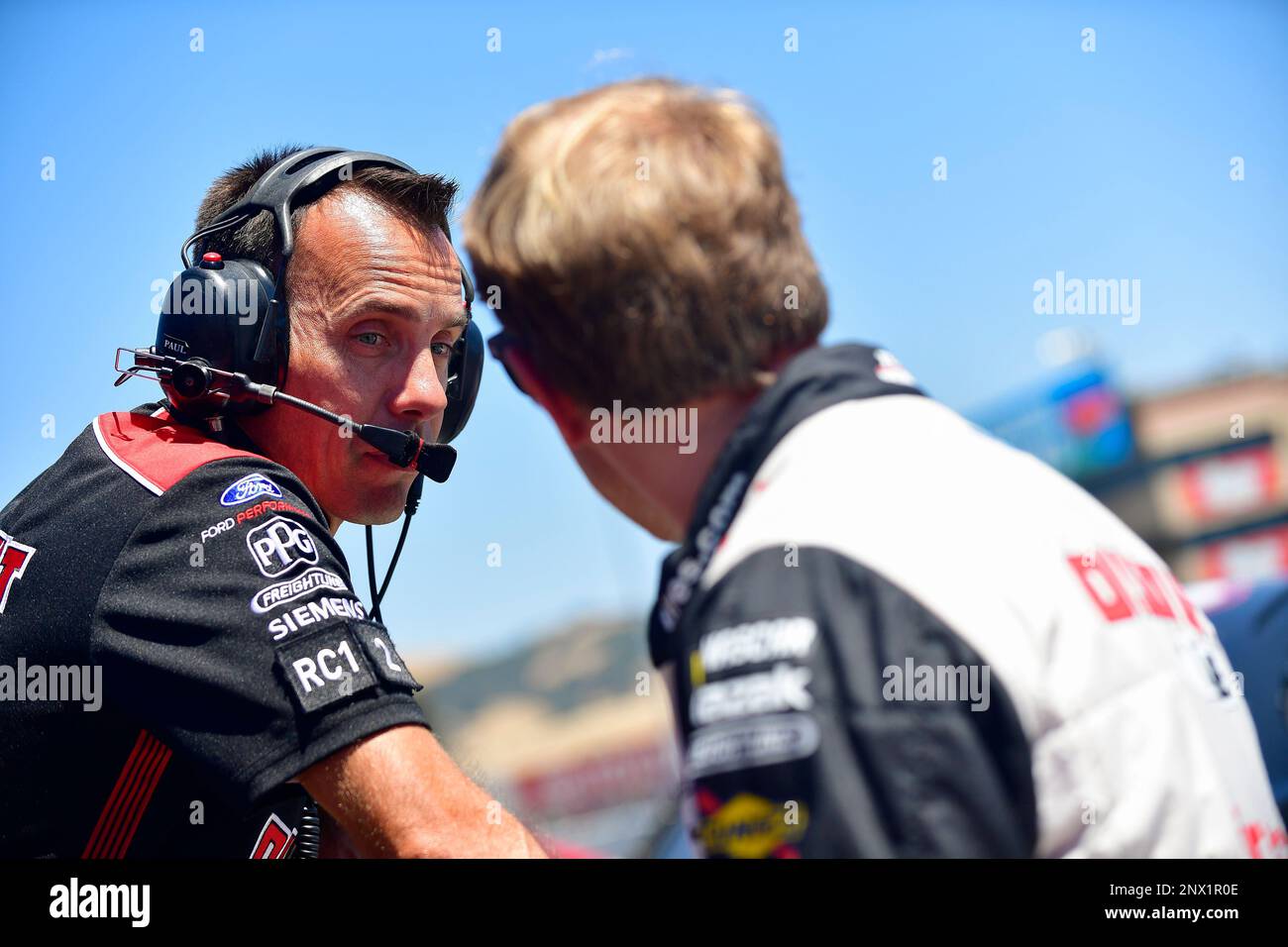 Crew chief Paul Wolfe (left) and Brad Keselowski during qualifying for ...