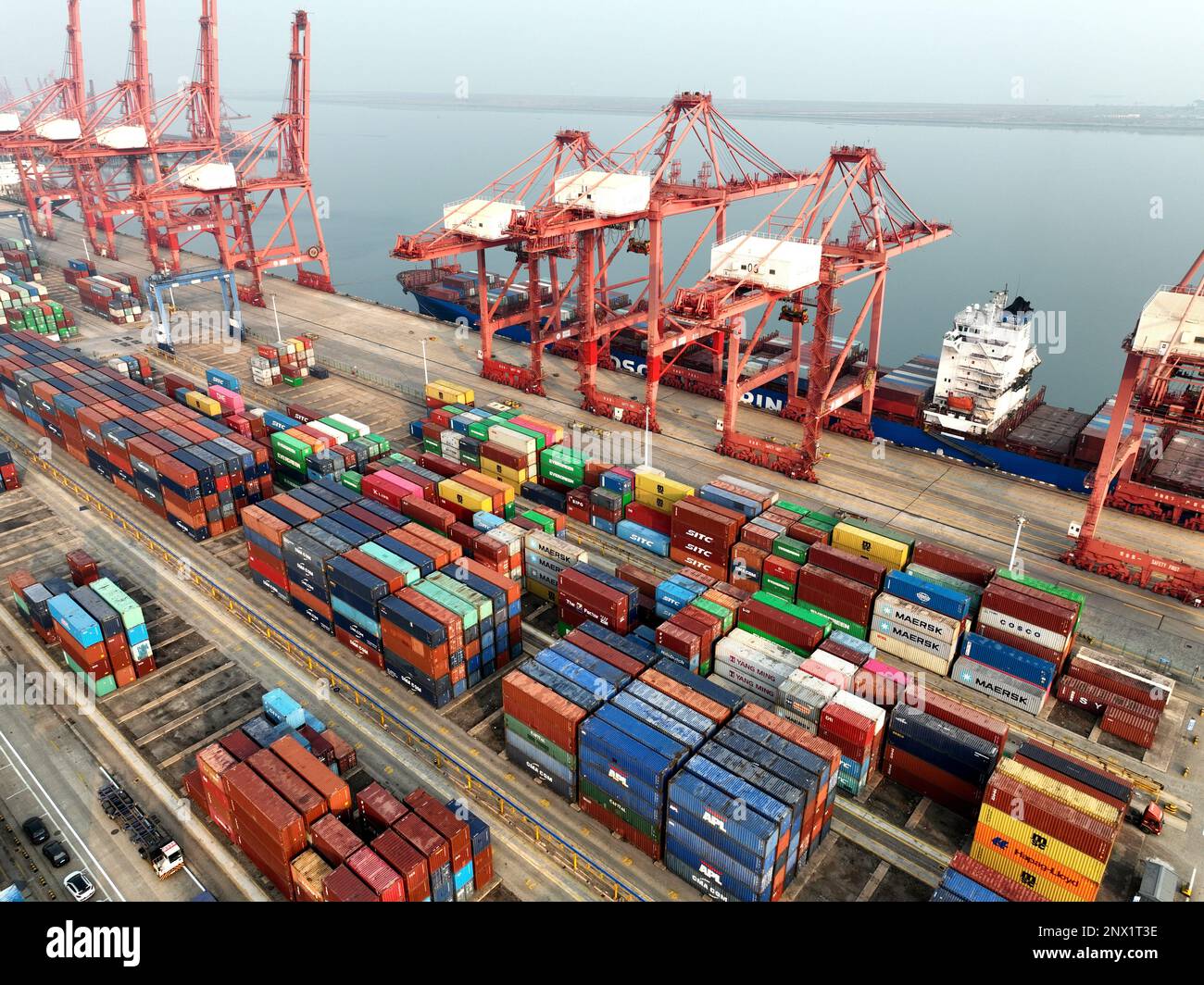 LIANYUNGANG, CHINA - FEBRUARY 1, 2023 - Ocean cargo ships load and ...