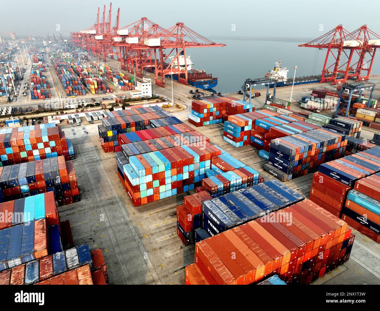 LIANYUNGANG, CHINA - FEBRUARY 1, 2023 - Ocean cargo ships load and unload cargo at the Port ...