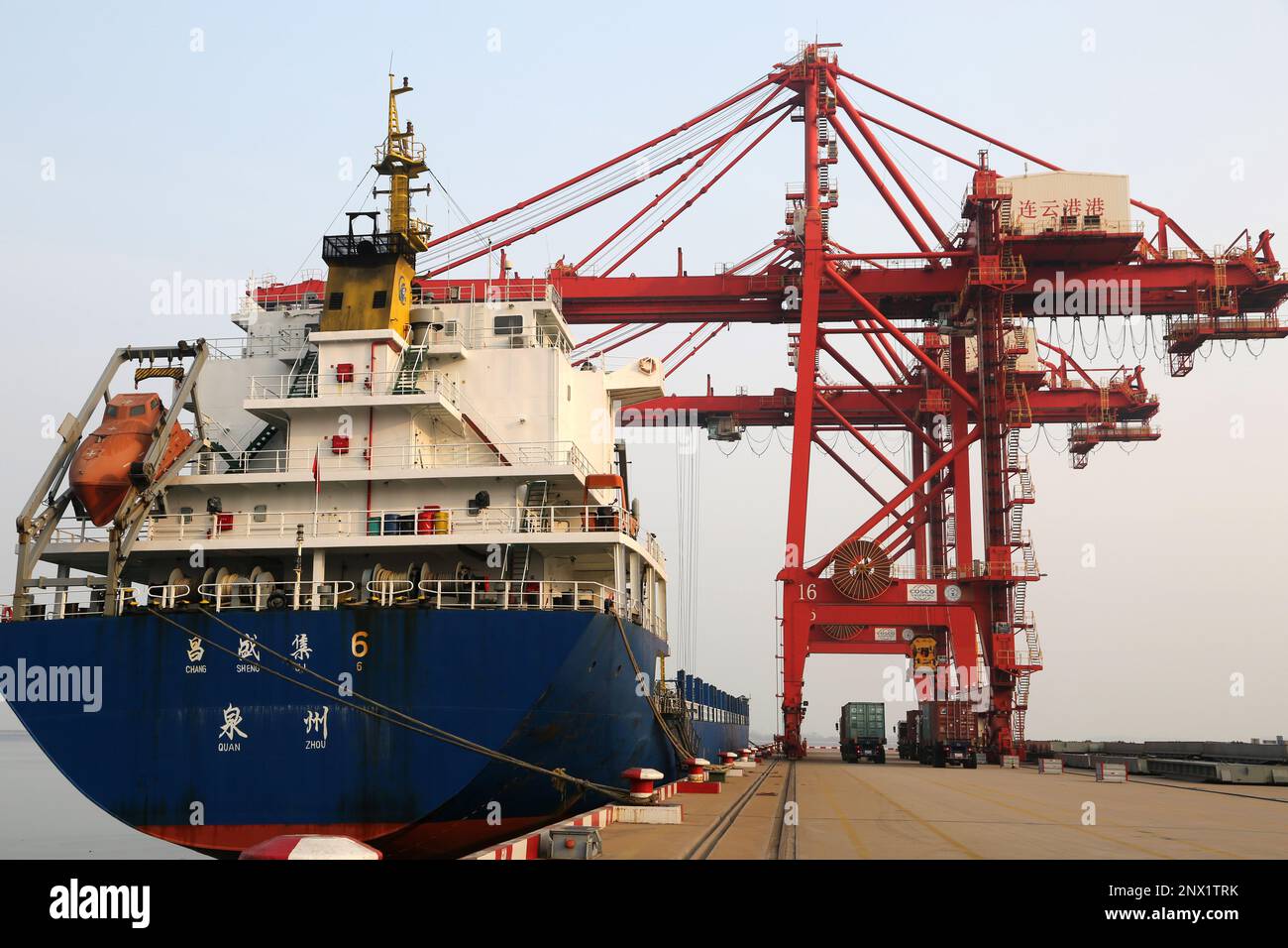 LIANYUNGANG, CHINA - FEBRUARY 1, 2023 - Ocean cargo ships load and ...