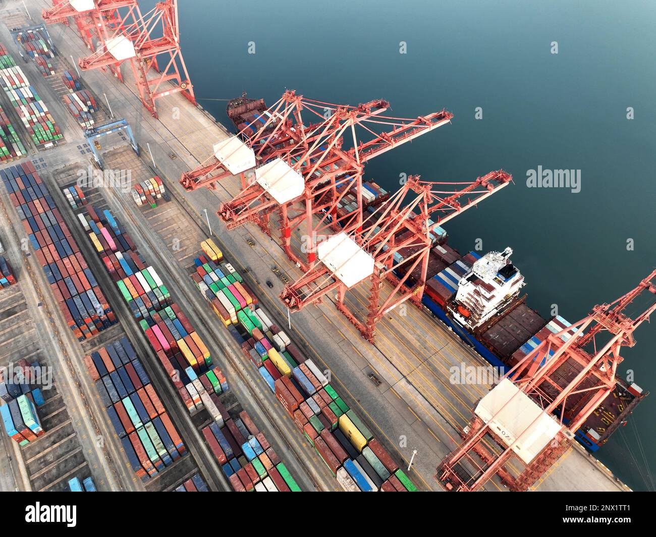 LIANYUNGANG, CHINA - FEBRUARY 1, 2023 - Ocean cargo ships load and ...