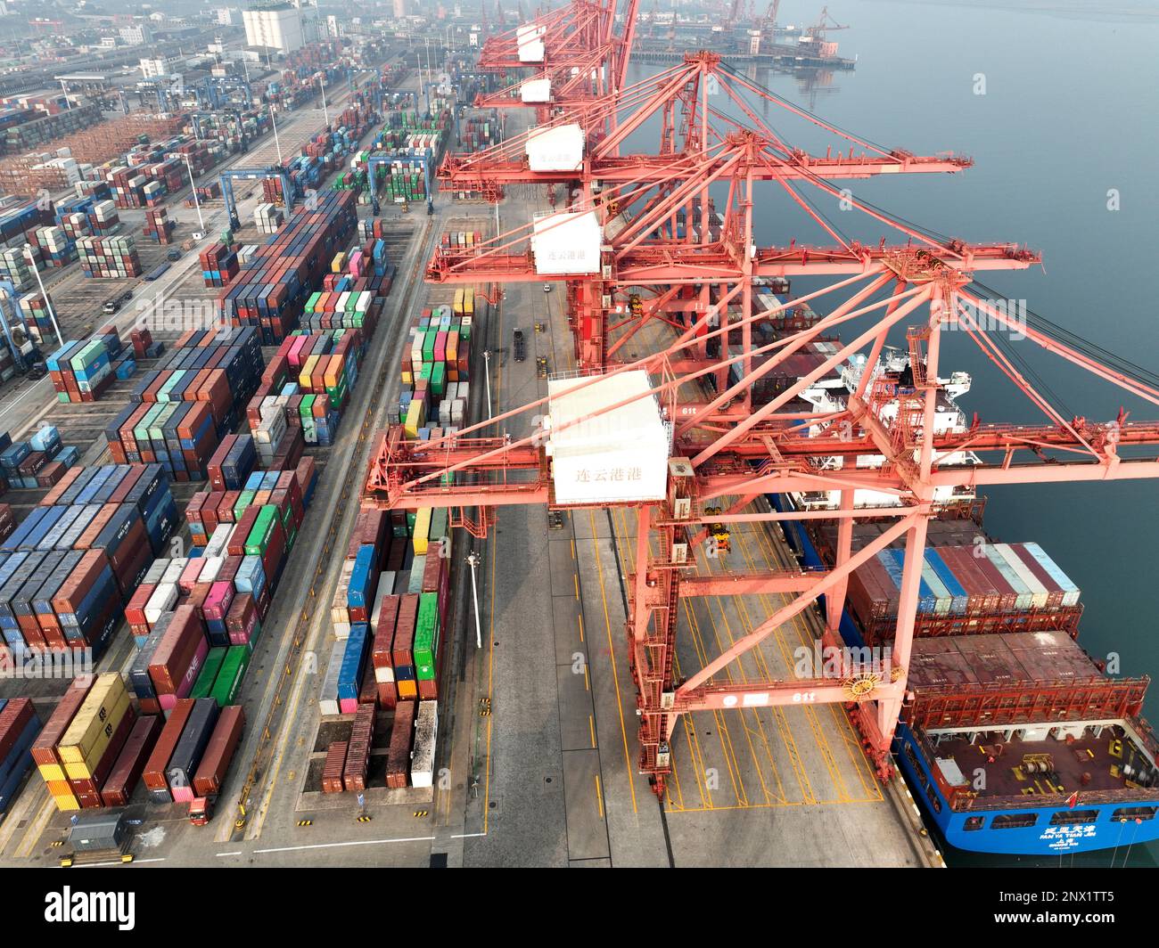 LIANYUNGANG, CHINA - FEBRUARY 1, 2023 - Ocean cargo ships load and unload cargo at the Port ...