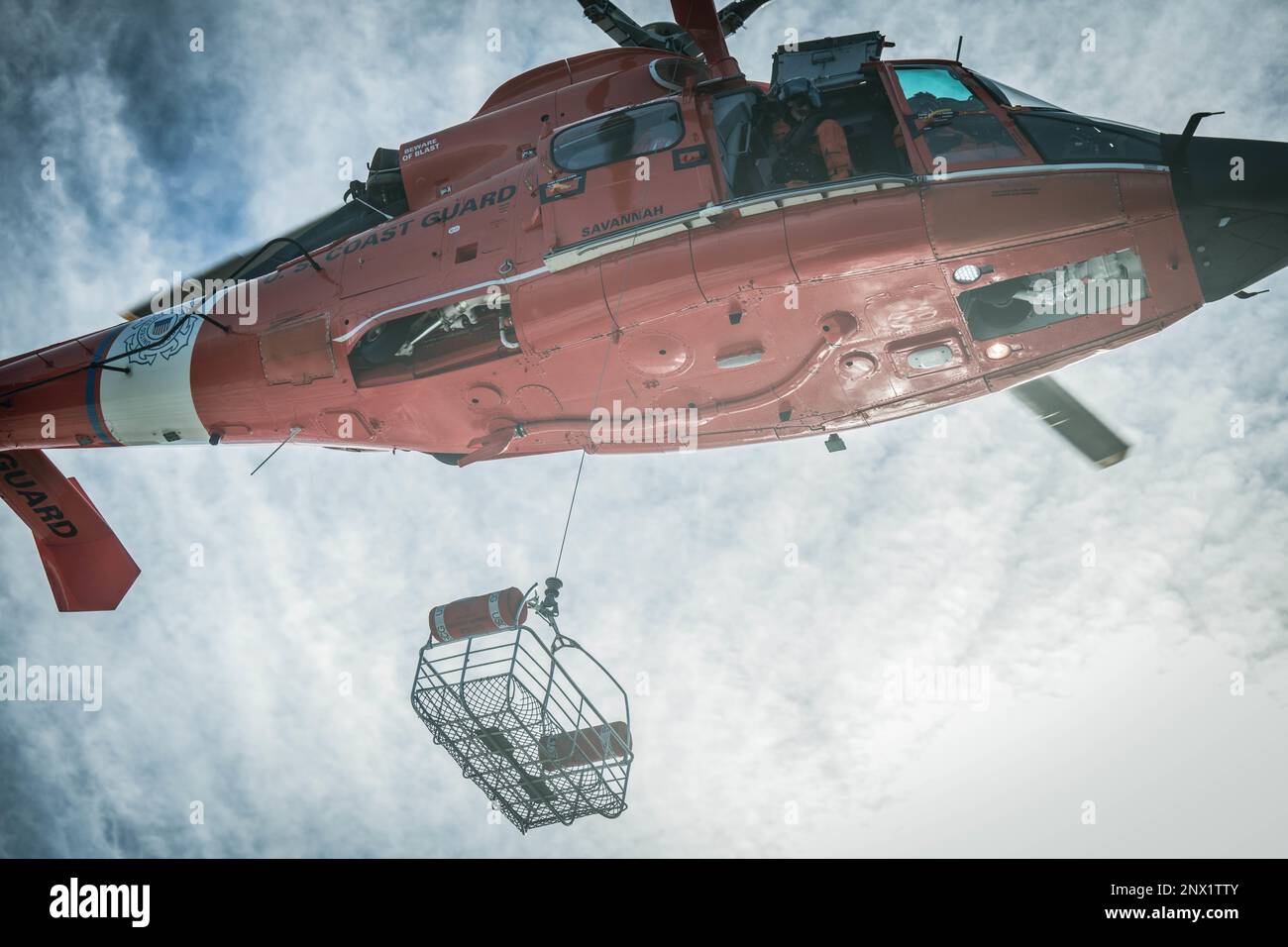 A U.S. Coast Guard Eurocopter MH-65 Dolphin Helicopter from Air station ...