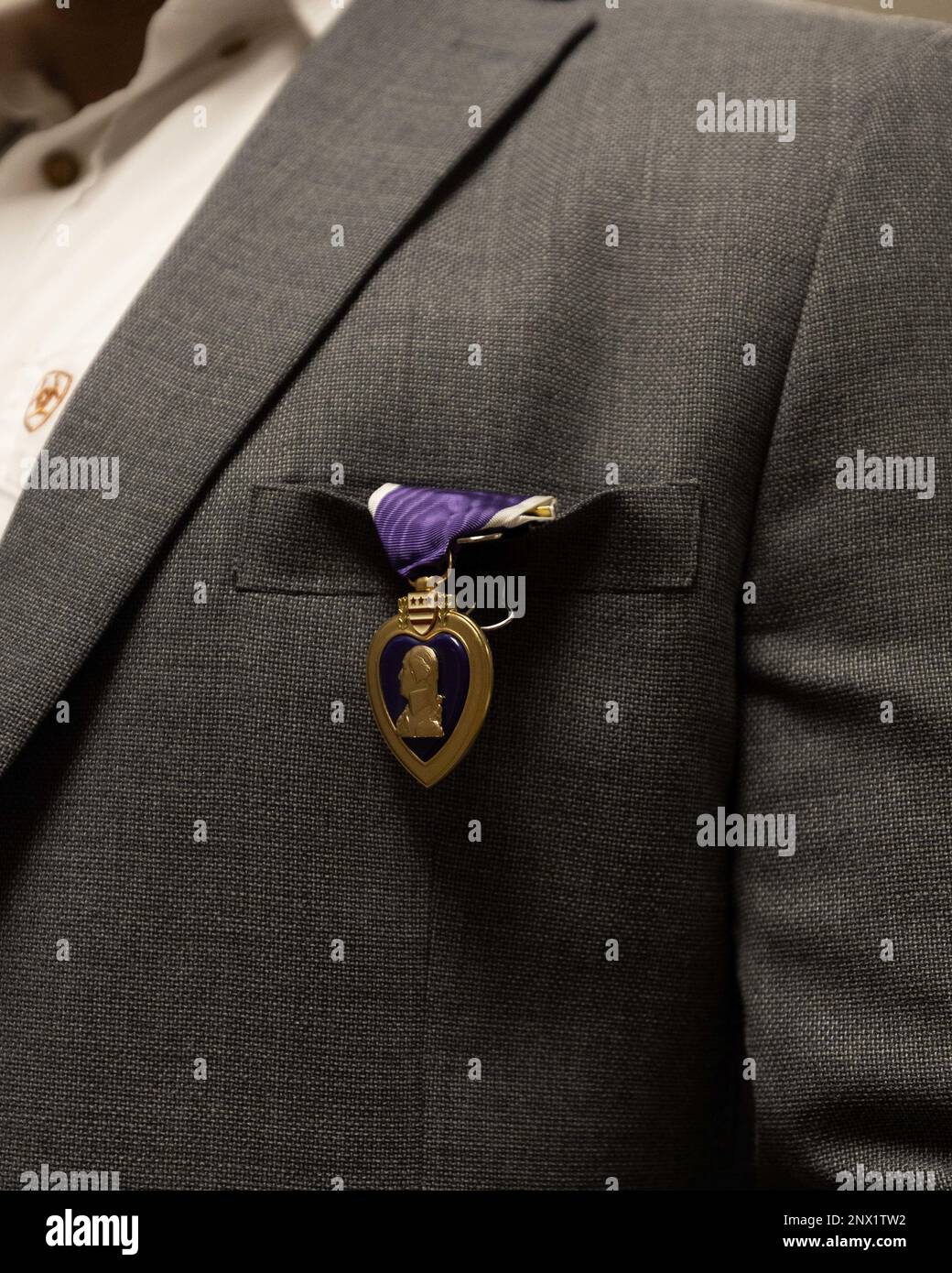 U.S. Marine Corps veteran Sgt. Gerardo Figueroa wears the Purple Heart ...