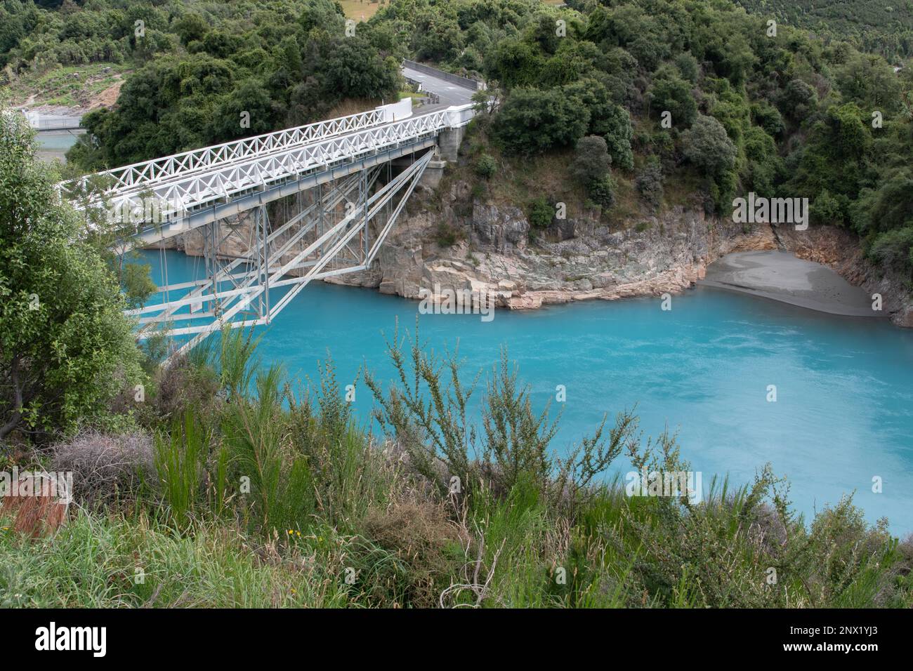 The vibrant blue water of the Rakaia river gorge in New Zealand as the ...