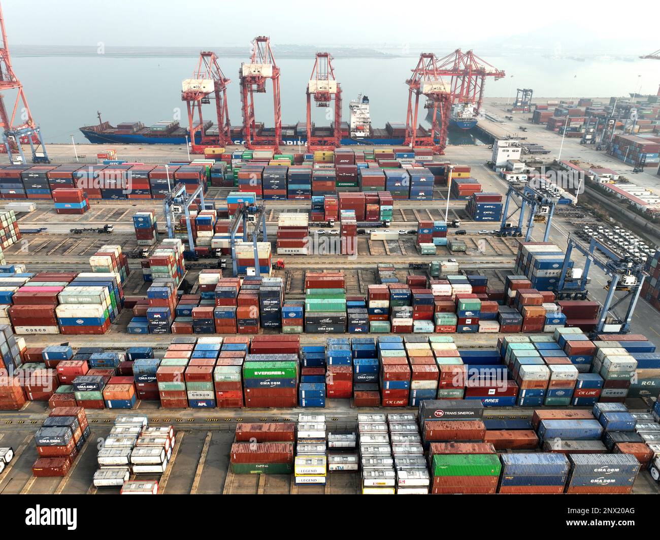 LIANYUNGANG, CHINA - FEBRUARY 1, 2023 - Ocean cargo ships load and ...