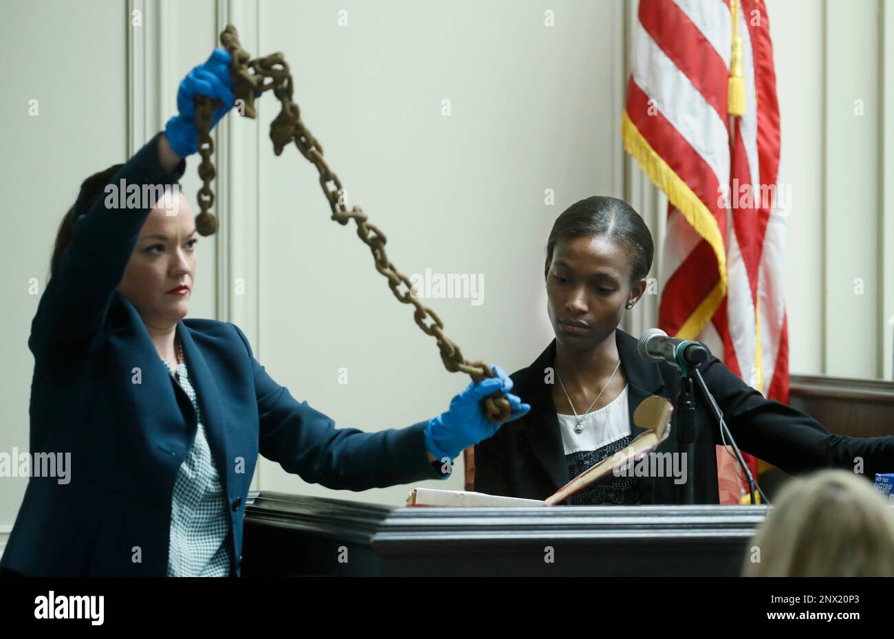 As Daniellla Stuart, right, a GBI special agent and crime scene ...
