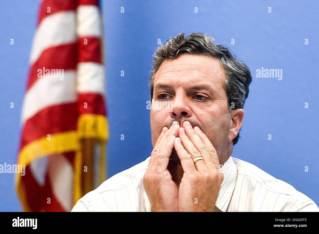 Andy Bergfeld listens to Wade Washmon, not pictured, speak during a ...