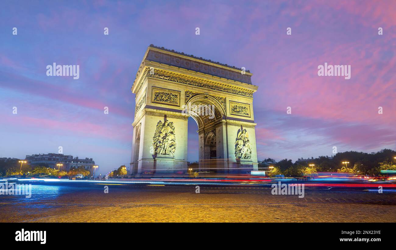 Arc de Triomphe in downtown Paris at sunset Stock Photo - Alamy