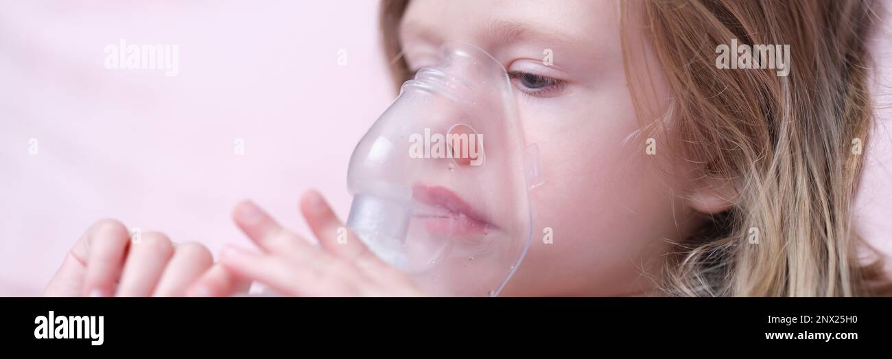 Portrait of child girl with inhaler for asthma Stock Photo - Alamy