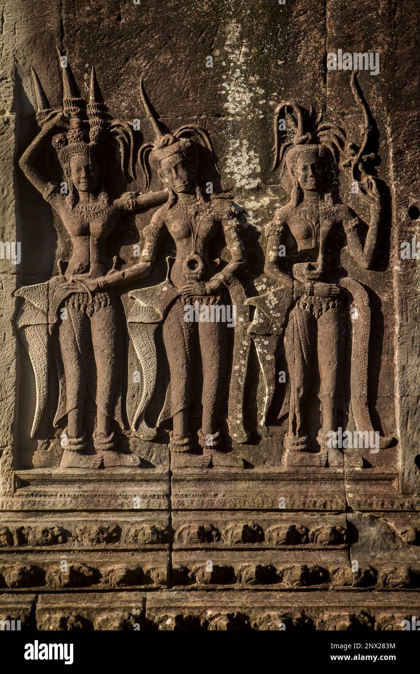 Aspara sculptures in bas-relief on the wall, in Angkor Wat, Siem Reap ...