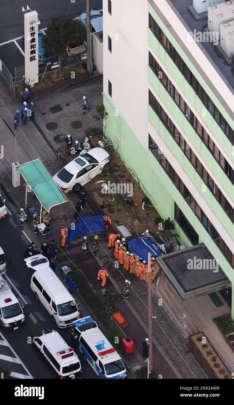 An aerial photo shows an automobile crashing into IkunoAiwa Hospital in ...