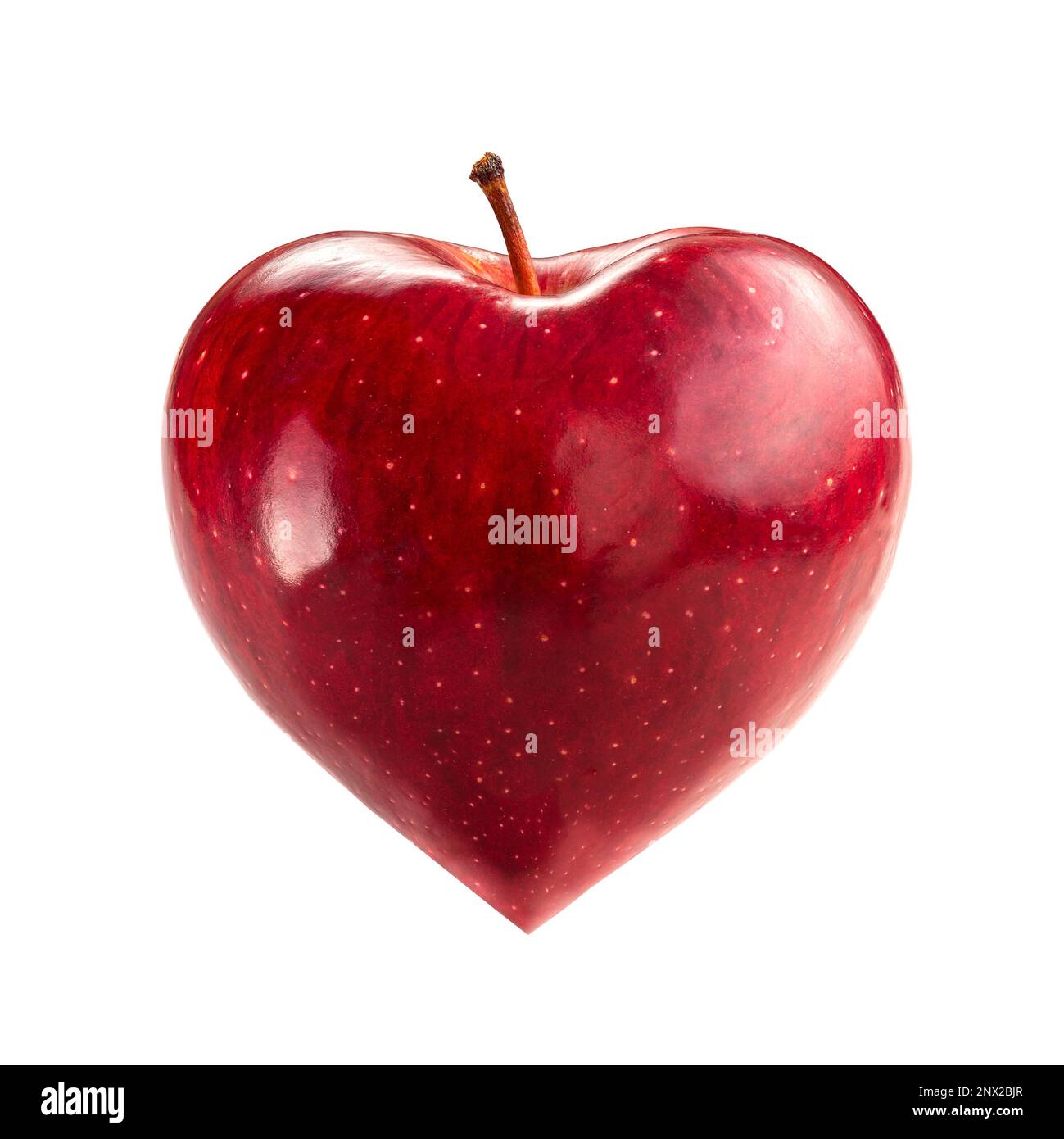 A Red Delicious Apple Shaped into a Heart Sign Isolated on A White ...