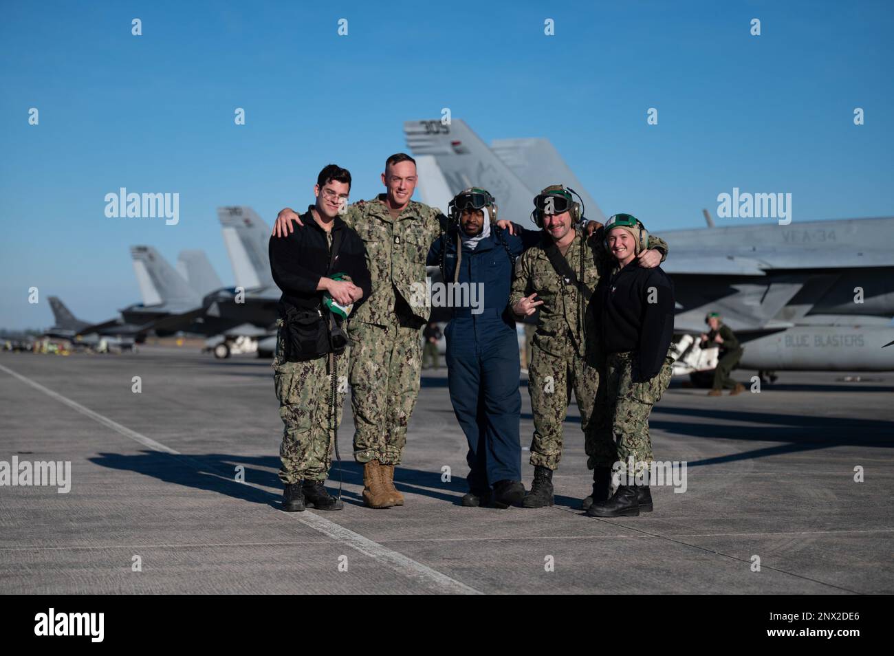 U.S. Sailors pose for a photo during Weapons System Evaluation Program ...