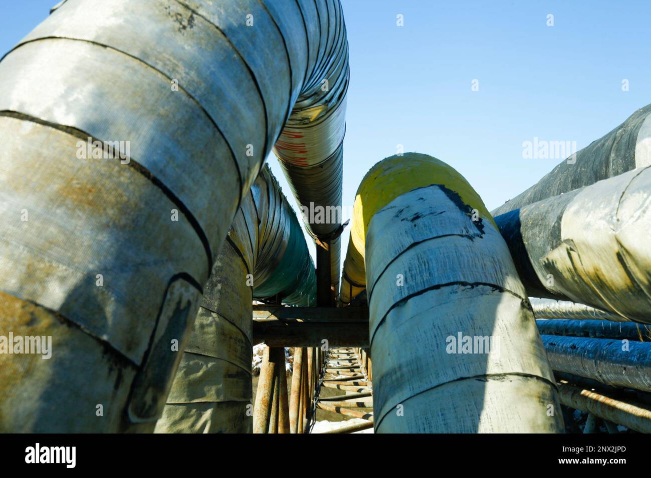 The pipe and valve oil fields Stock Photo - Alamy
