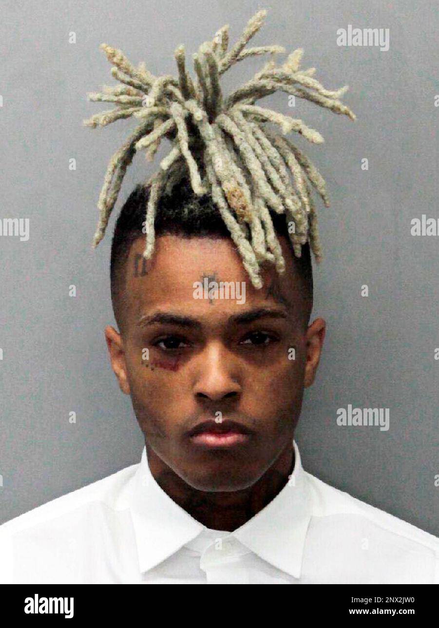 This undated mugshot released by the Miami- Dade Corrections ...