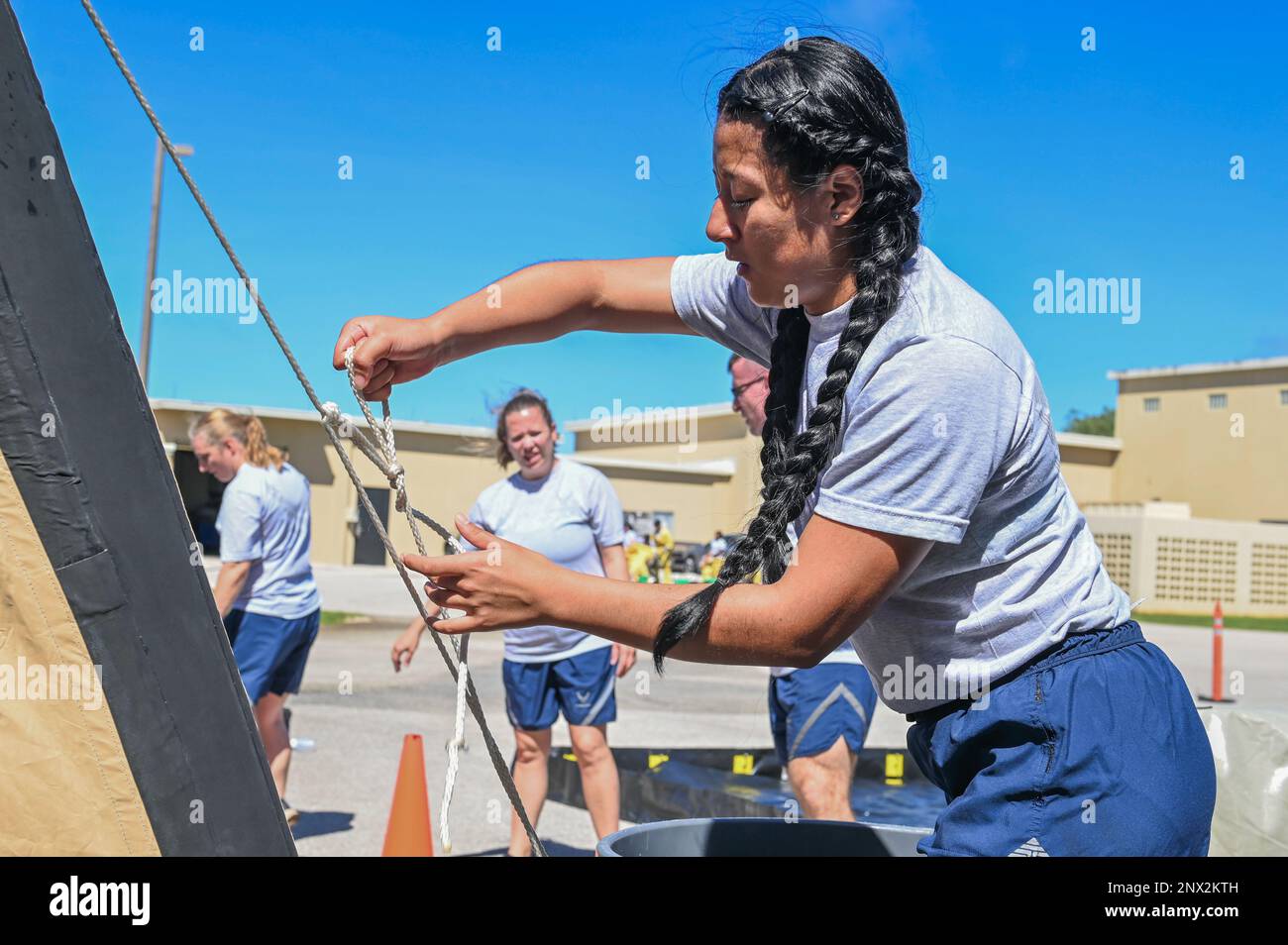 U.S. Air Force Airmen from the 36th Medical Group apply decontamination ...