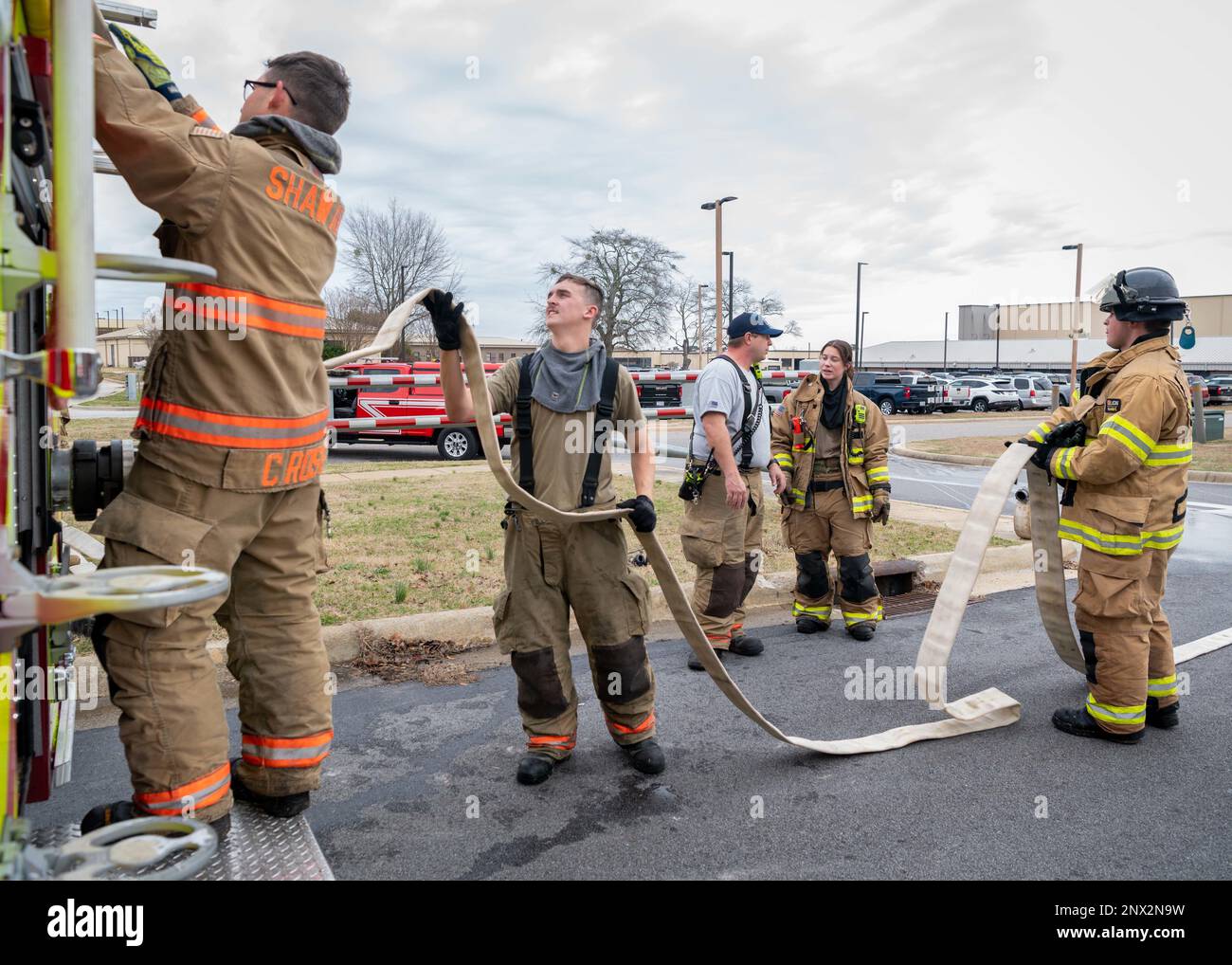 Firefighters assigned to the 20th Civil Engineer Squadron pack their ...