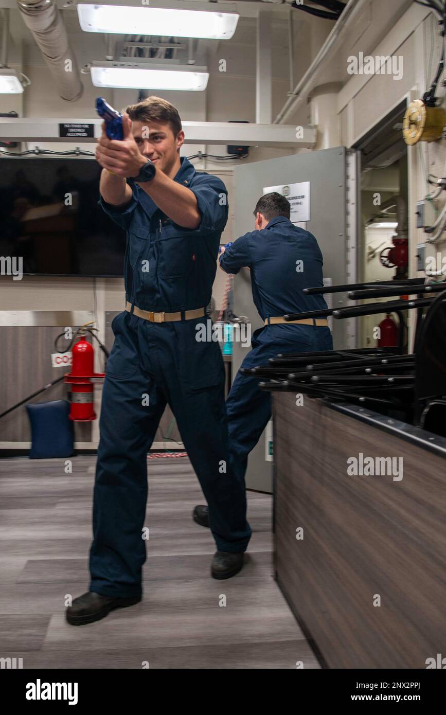 230217-N-MK109-1017 SOUTH CHINA SEA (Feb. 17, 2023) U.S. Navy Ensign ...