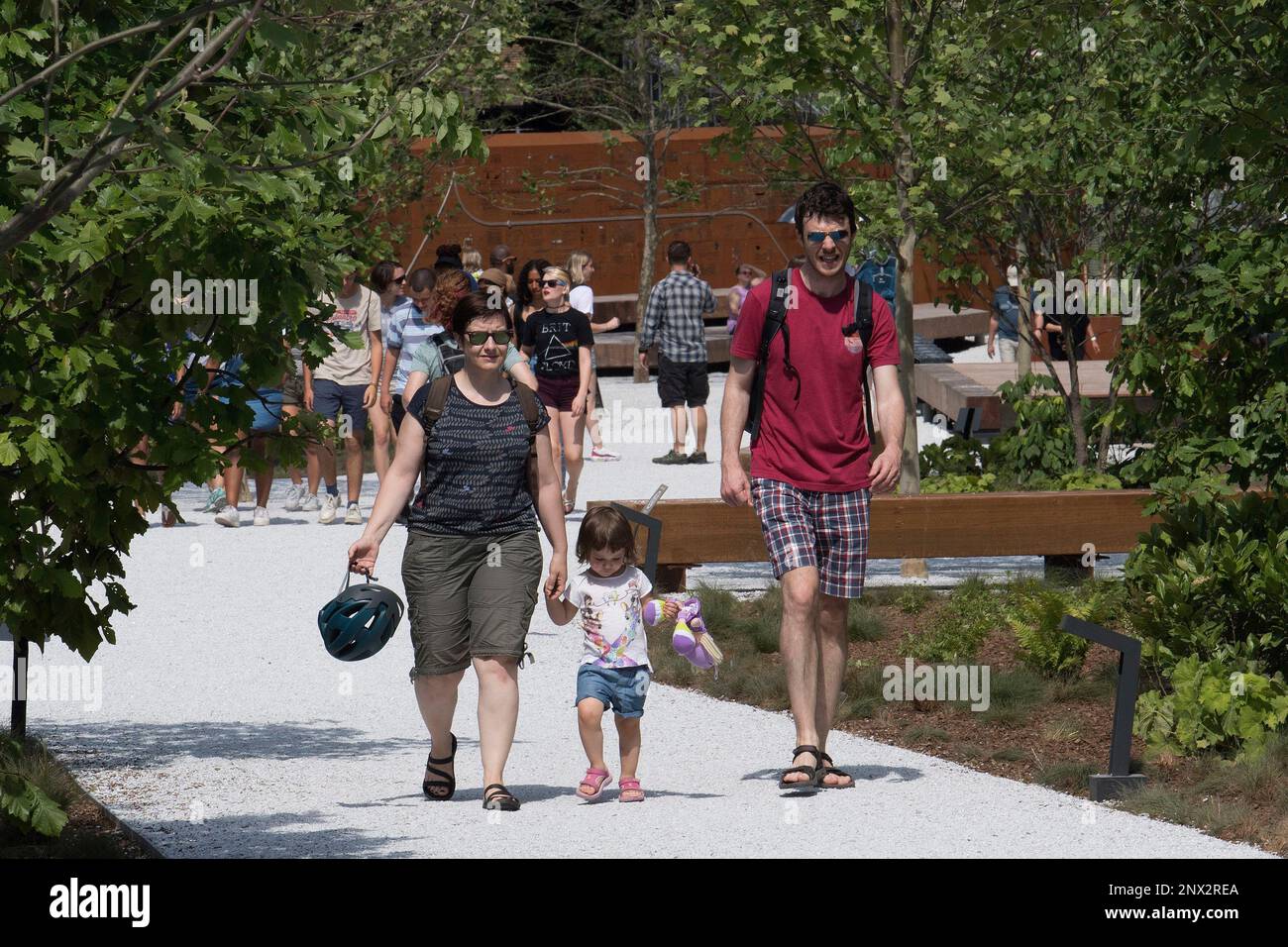 From left, Sylvia Gardini, Anna Gardini and Alex Gardini walk along ...