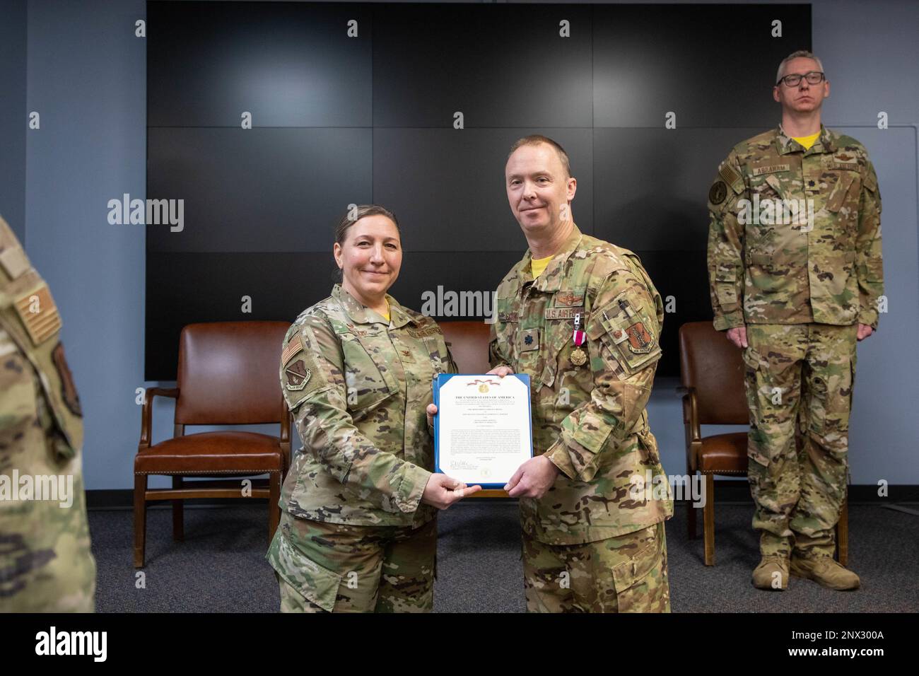 Col. Leah Voelker, 127th Air Refueling Group commander, presents Lt ...