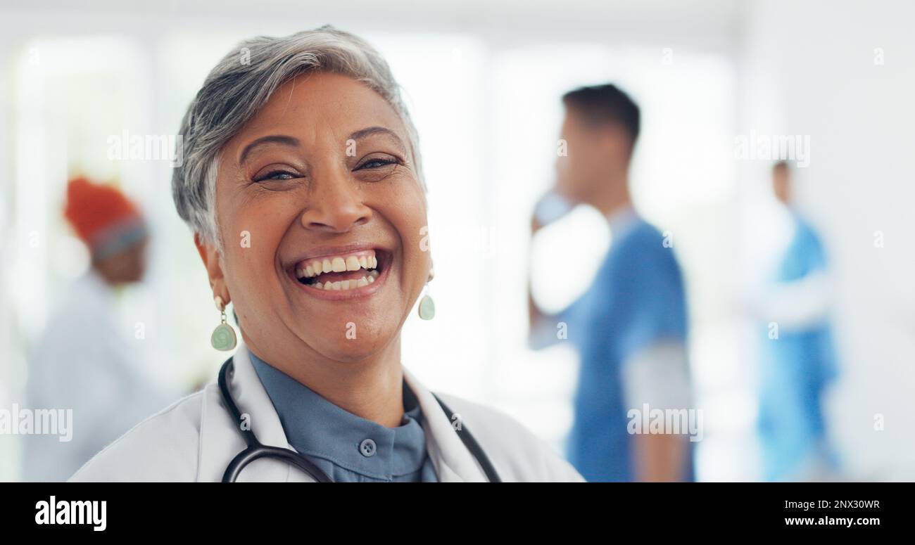 Face, doctor and woman laughing in hospital ready for tasks, goals or ...