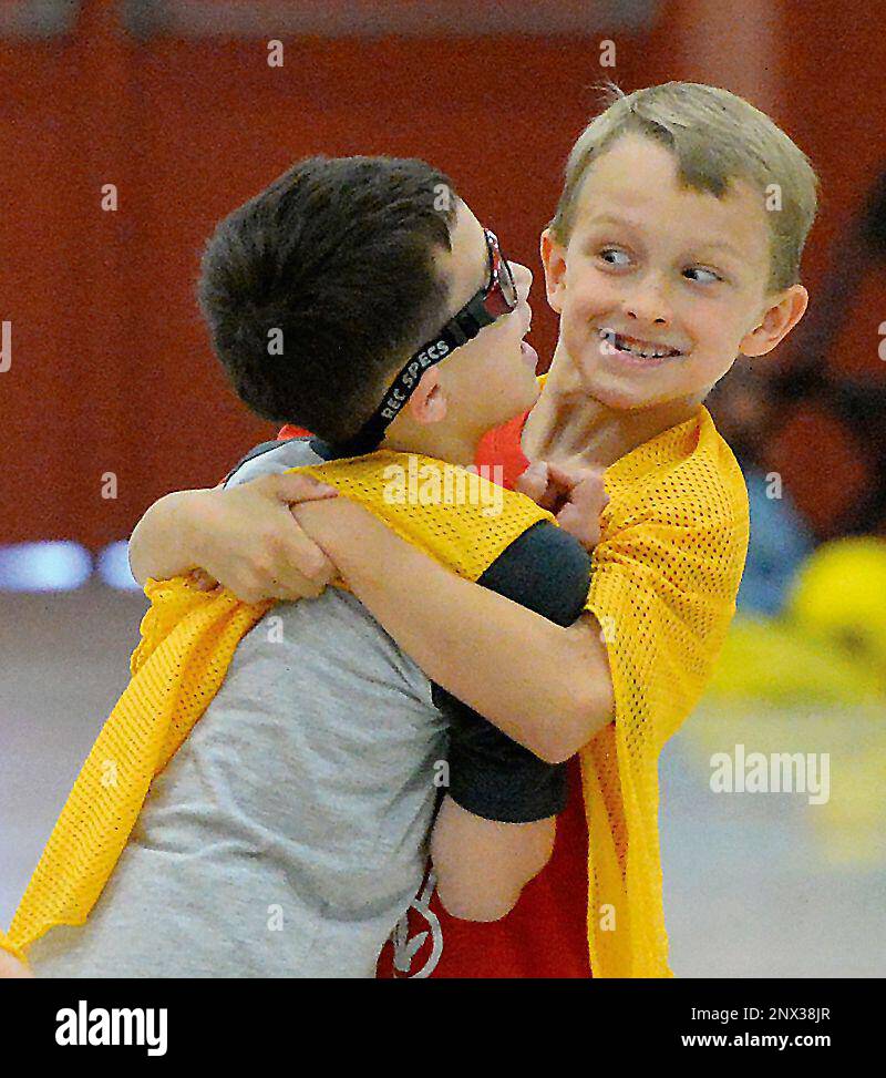 In this June 11, 2018 photo, Greyson Ferguson, right, and teammate ...