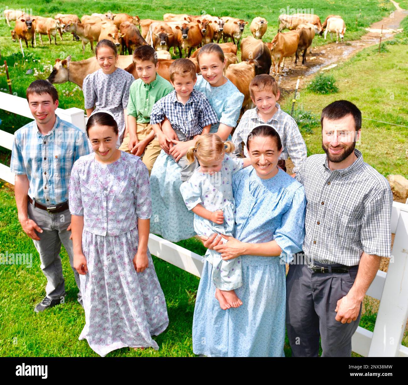 Lynford and Sharon Wenger, lower right, their eight children and the ...