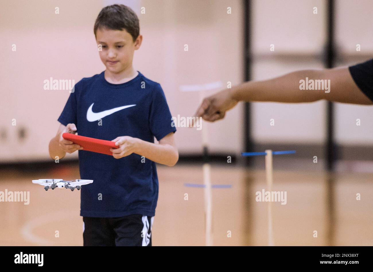 In a Wednesday June 6, 2018 photo, instructor Tamika Hamlett helps John ...