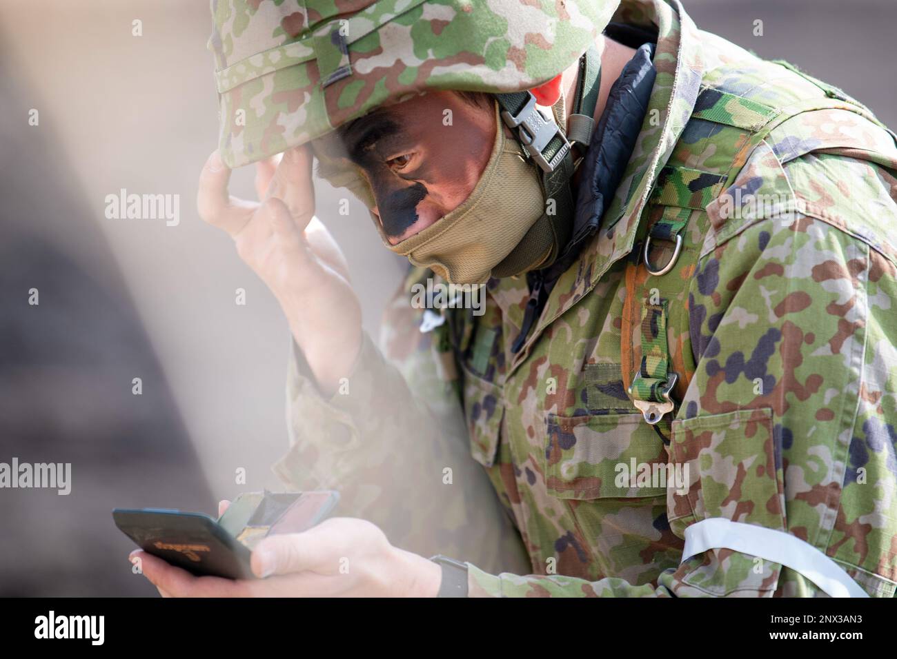 A Japan Ground Self-Defense Force paratrooper assigned to the 1st ...