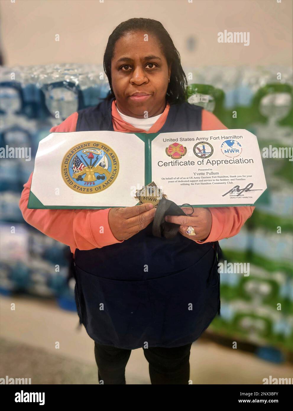 Mrs. Yvette Pullum, with the Certificate of Appreciation and challenge ...