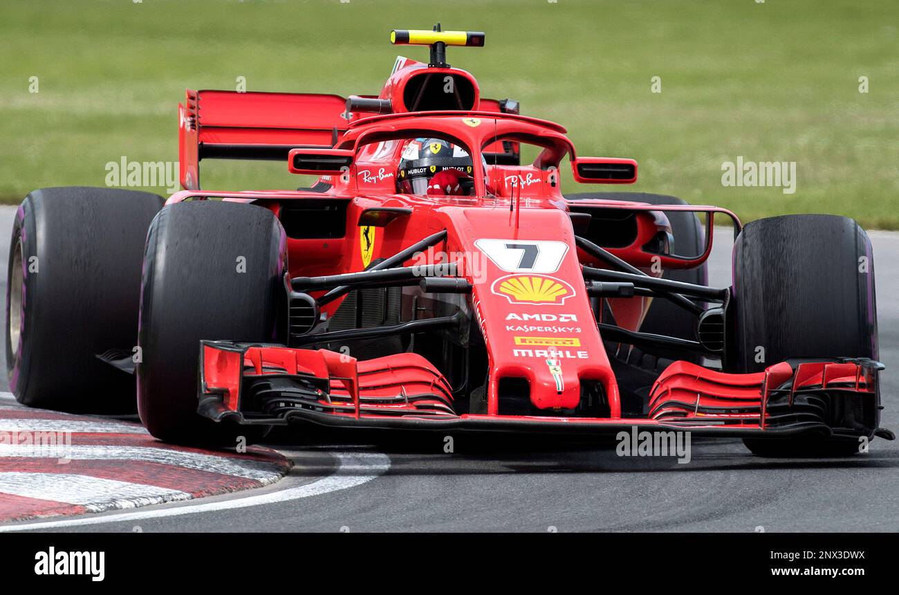 Ferrari driver Kimi Raikkonen, of Finland, rounds the Senna corner ...