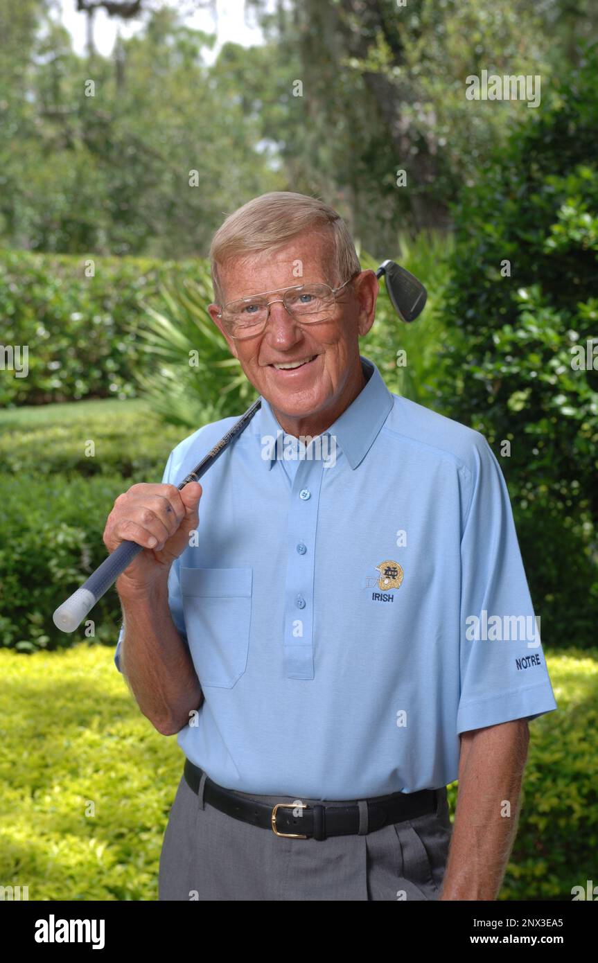 Former college head football coach Lou Holtz stands outside his home ...