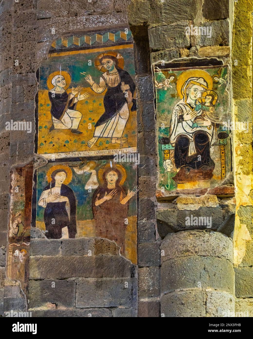 The side aisles of the Basilica of San Pietro in Tuscania contain two ...