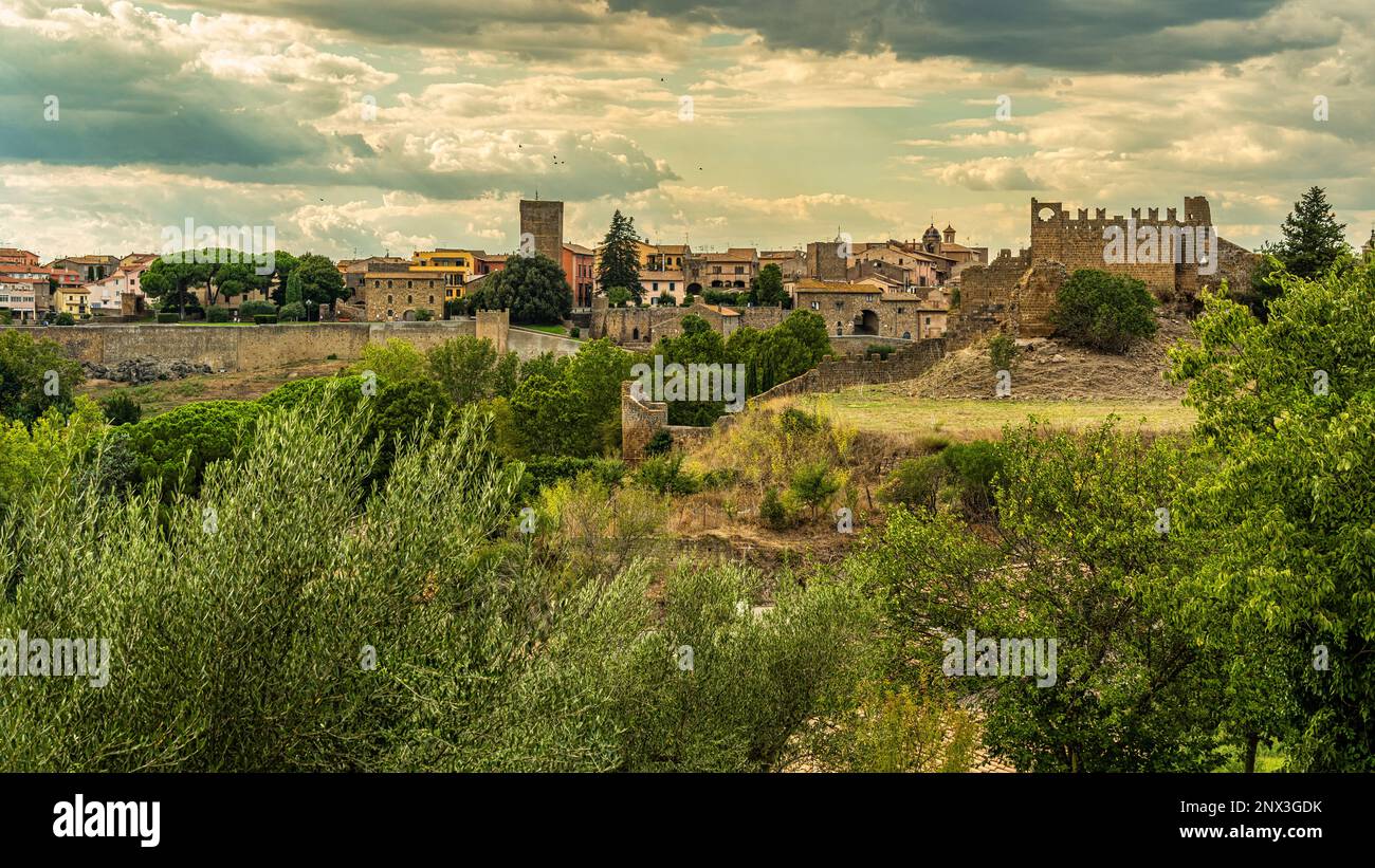 Panorama of the crenellated walls and towers of the Etruscan city of ...