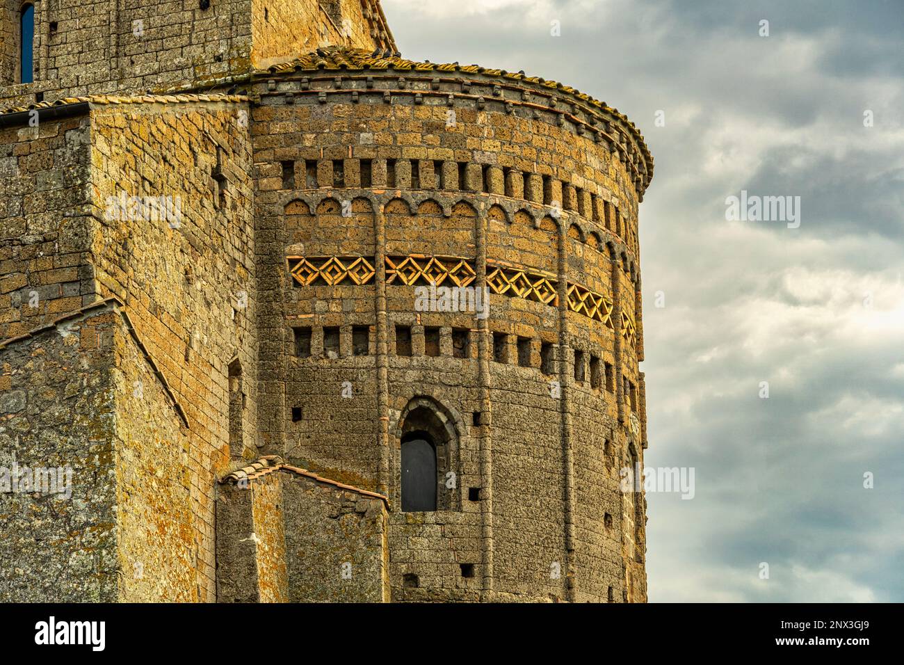 Detail of the rear apse in tuff bricks of the Basilica of San Pietro in ...