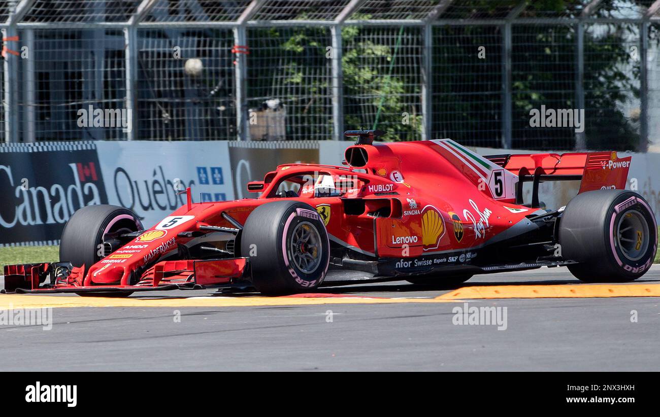 Ferrari driver Sebastian Vettel of Germany drives into the final ...
