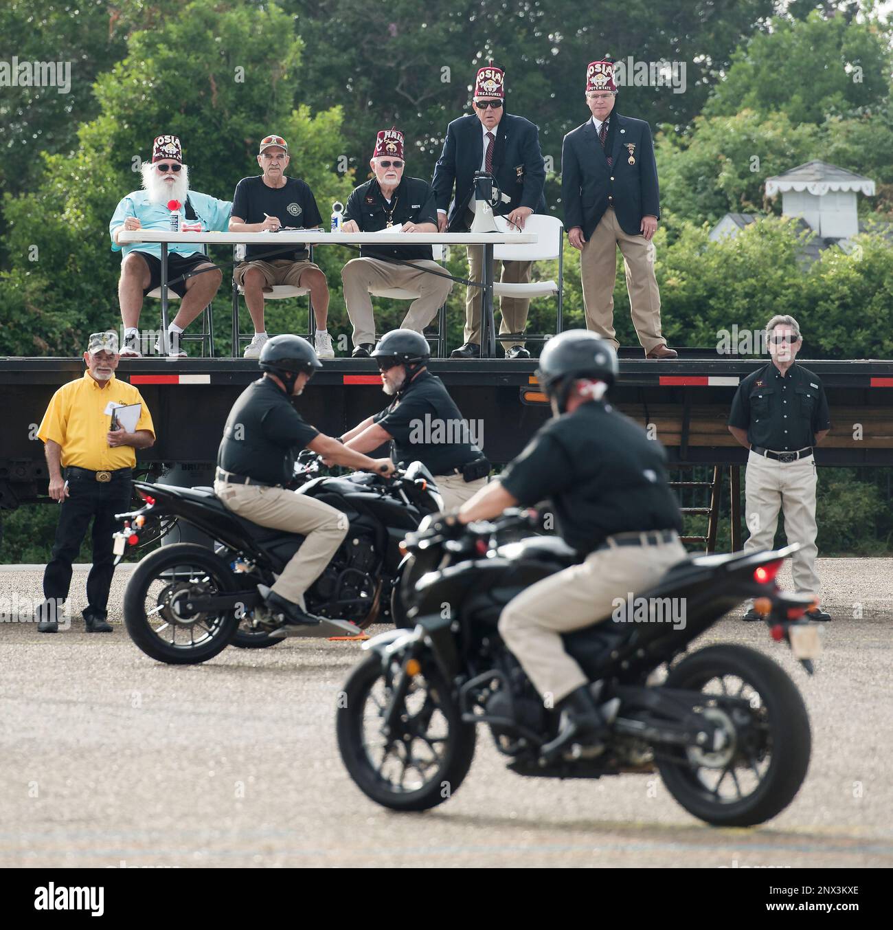 Judges watch the Moslah motor corps from Fort Worth compete during the ...