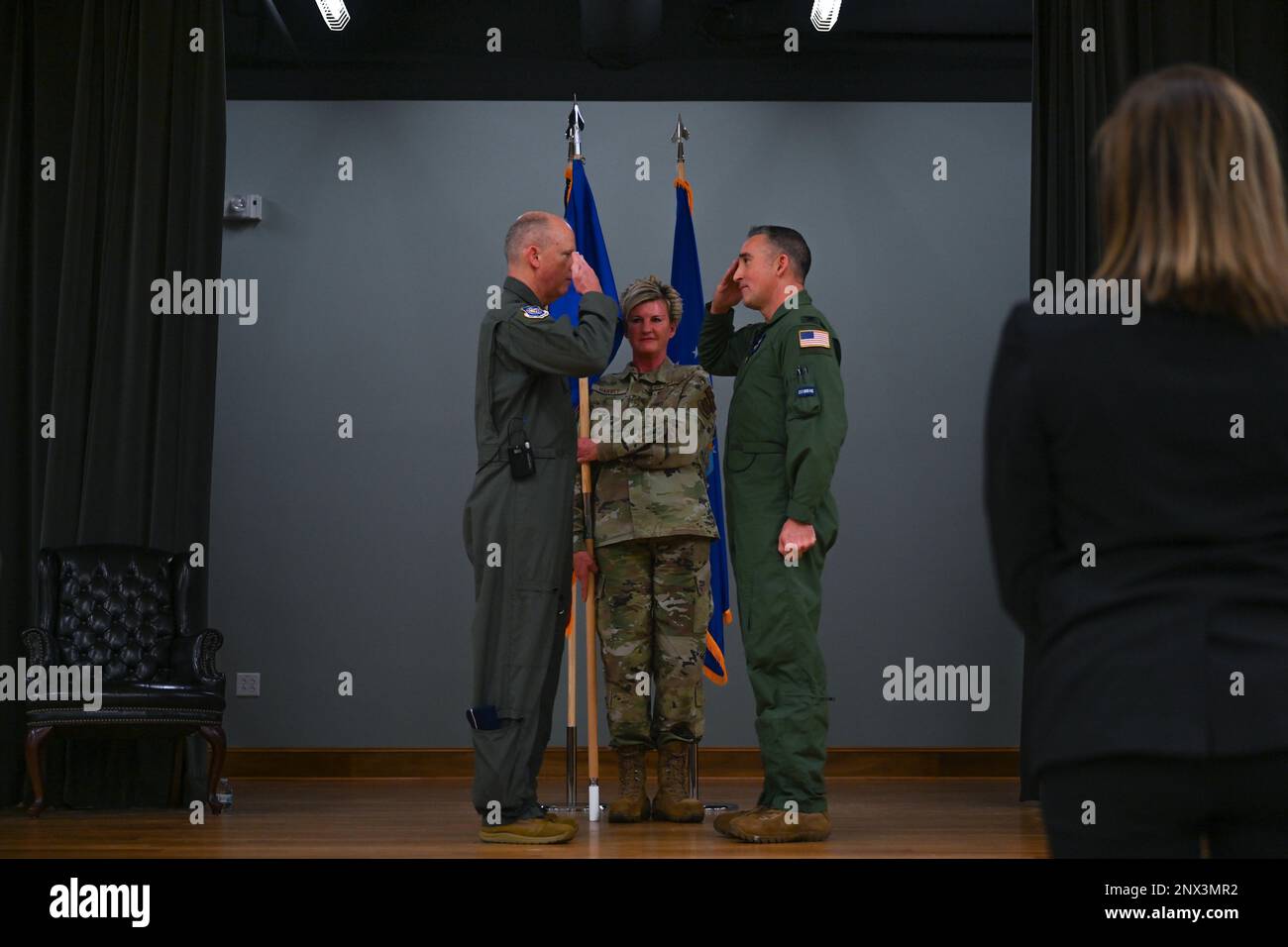 Col. Thomas Lessner, 913th Airlift Group commander (right) renders a ...