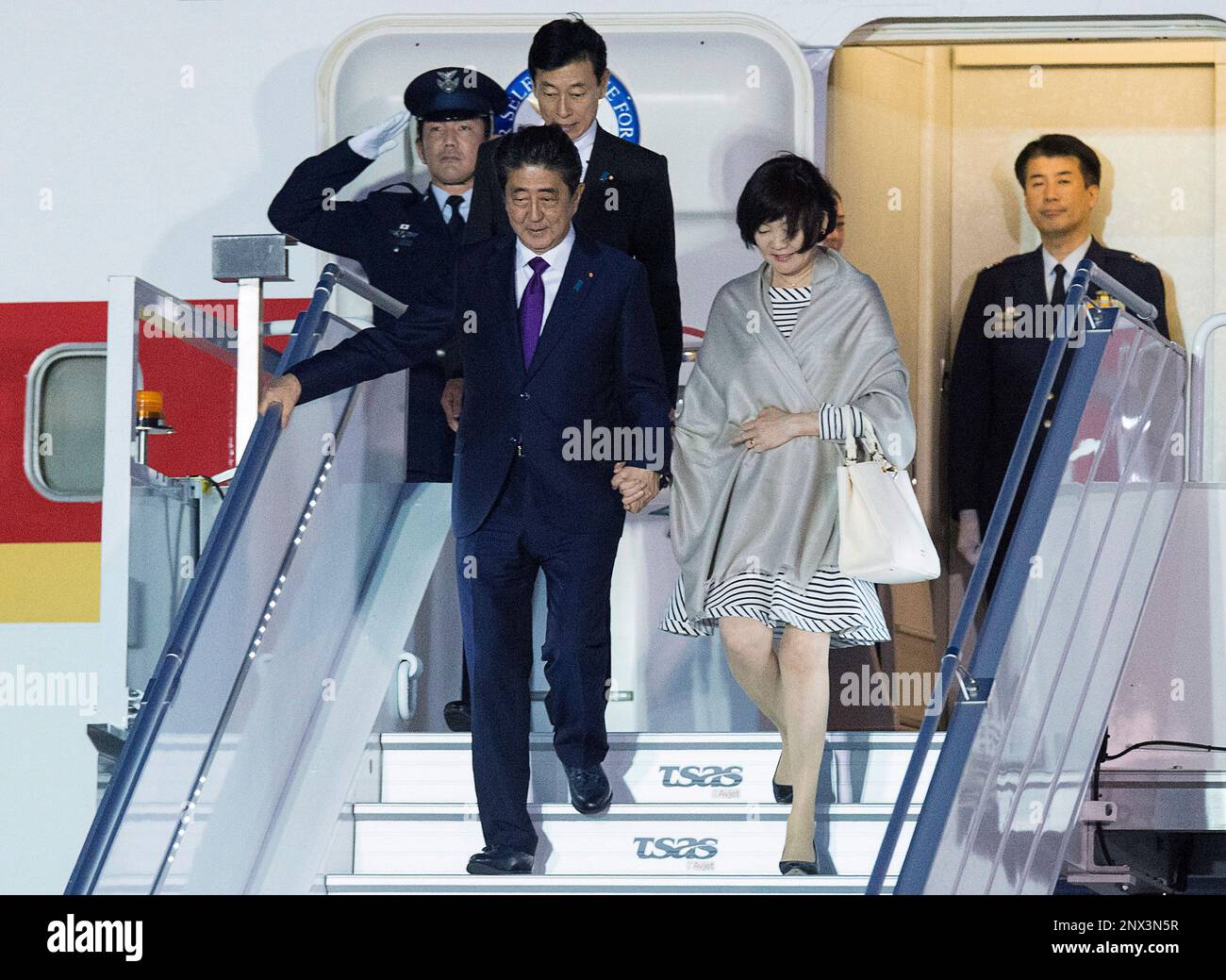 Japanese Prime Minister Shinzo Abe and his wife Akie Abe arrive at the ...