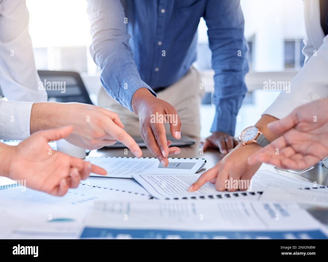Documents, teamwork and hands pointing in office for planning sales strategy. Cooperation ...