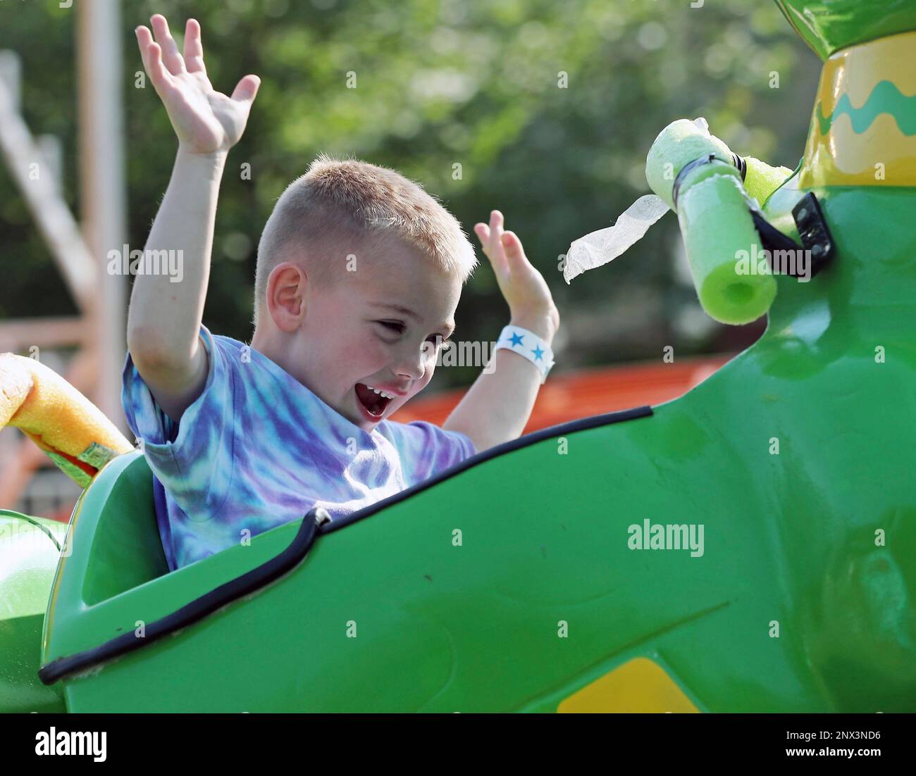 Harry Faisst, 7, enjoys the Go Gator ride at the Greek Festival ...