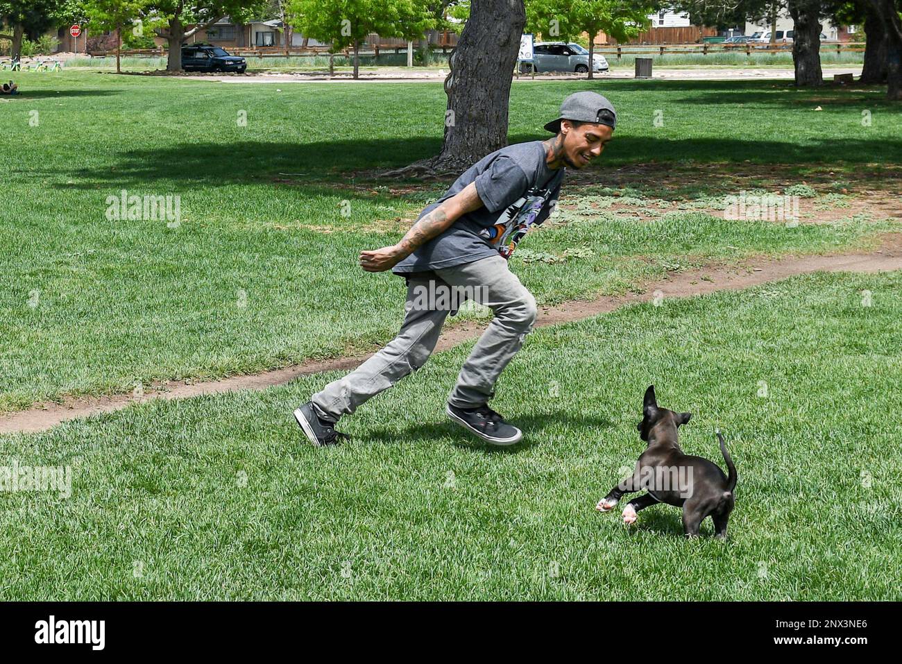 In this Thursday, May 24, 2018, photograph, Gregg Jones runs with ...