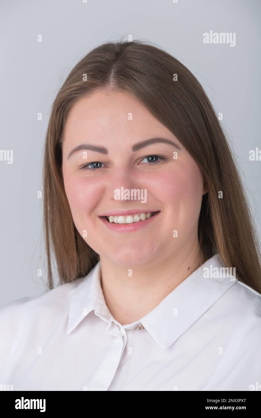 Portrait of happy plus size woman. Beautiful young overweight female ...