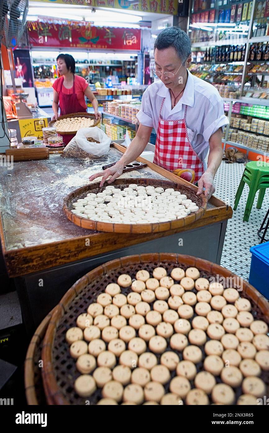 Small cookies are steamed. In Rua da Felicidade,Macau,China Stock Photo ...