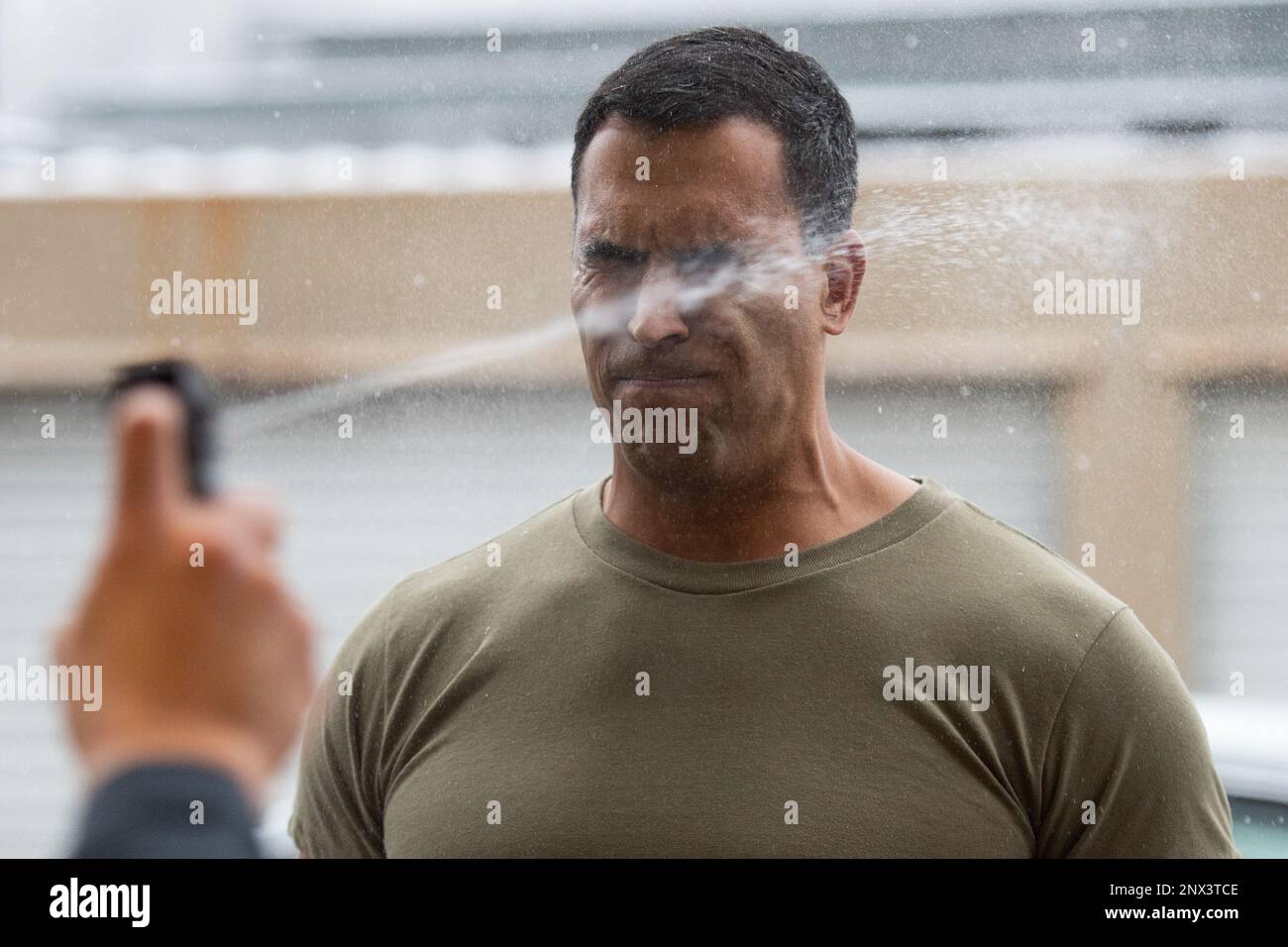 Chief Master Sgt. Alan Weary, installation command chief, is sprayed ...